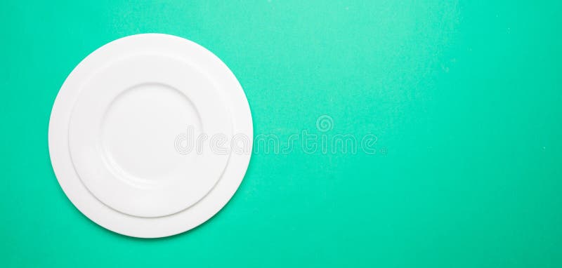 Empty White Plates on Green Color Background, Banner Stock Photo ...