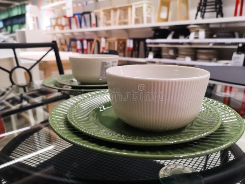 Empty White Porcelain Tea Cup with Saucers on a Glass Table Stock Image ...