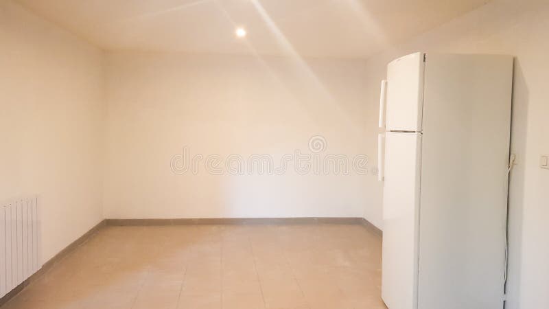 Empty White Room with a Fridge Stock Image - Image of tile, lighting ...