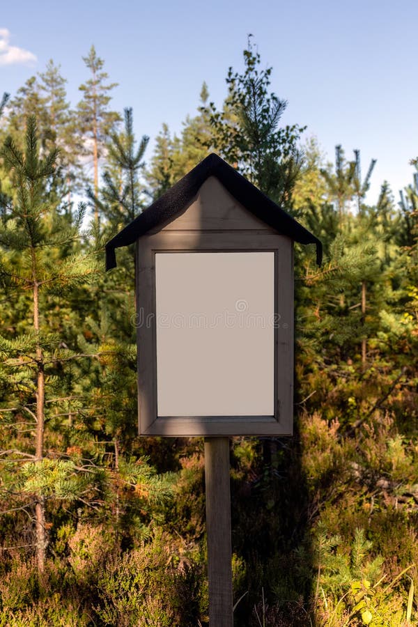 Empty White Sign in Nature, with Green Trees in the Background Stock ...