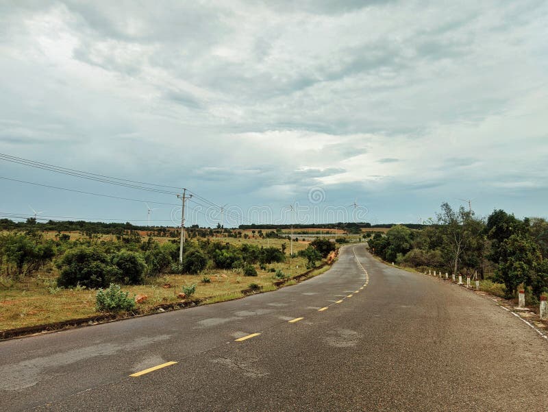 An Empty Wide Curvy Road in Rural Remote Area Stock Image - Image of ...