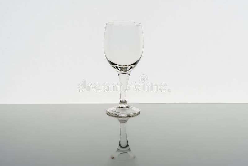 Empty Wine Glass with Reflection on Background, Front View Stock Photo ...
