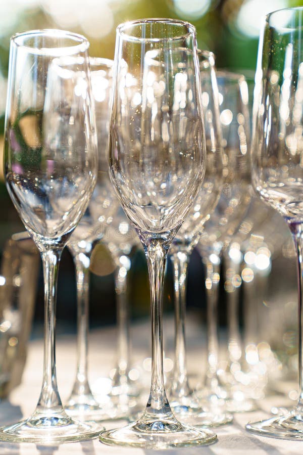 Empty Wine Glasses on an Open-air Table. the Sun S Rays in the Glass ...
