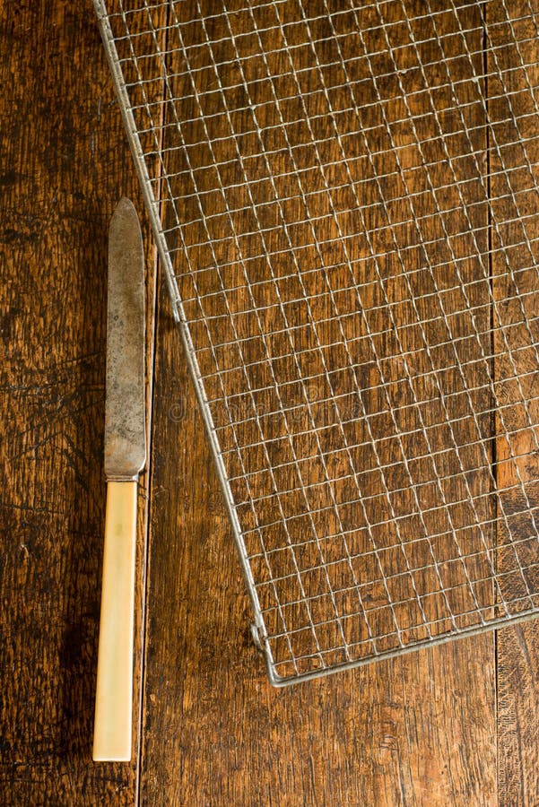 Empty Wire Cooling Rack on Wooden Table Stock Photo - Image of ...