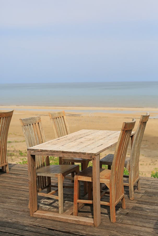 Empty Wood Table and Chairs at Restaurants Near the Beach Stock Image ...