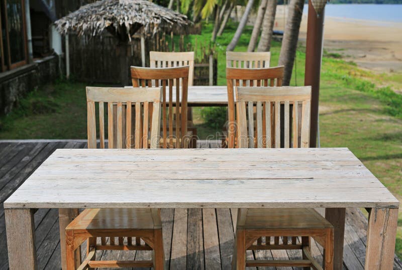 Empty Wood Table and Chairs at Restaurants Near the Beach Stock Image ...