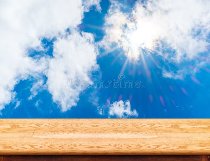 Empty Wood Table with Sun Ray and Sky, Mock Up for Display of Pr Stock ...