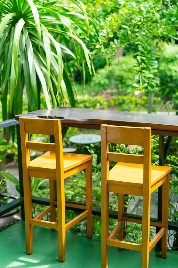 Empty Wooden Bar Stool in Garden Stock Image - Image of garden, modern ...