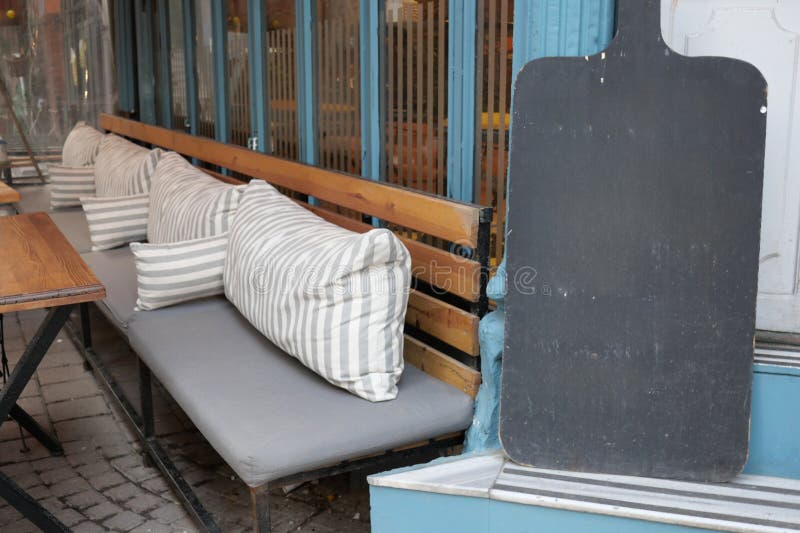 Empty Wooden Blackboard Mockup Standing Outdoors in Front of Cafe Stock ...