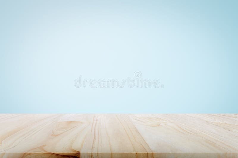 Empty Wooden Deck Table Over Light Blue Wallpaper Background for ...