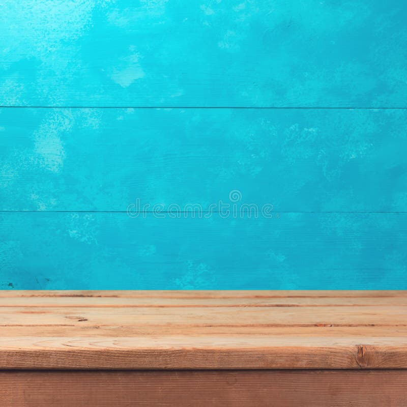 Empty Wooden Deck Table Over Rustic Blue Background. Summer Concept ...