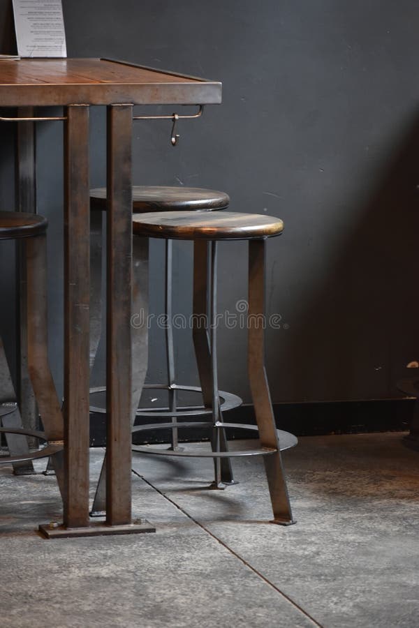Empty Bar Stools Pulled Up To the Table Stock Photo - Image of ...