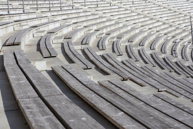.an Empty, Wooden-seated Amphitheater with Concrete Structures Stock ...