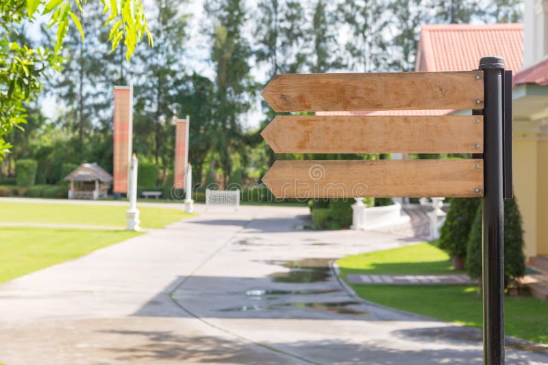 Empty Wooden Signs for Text with View of the Green Garden Stock Photo ...