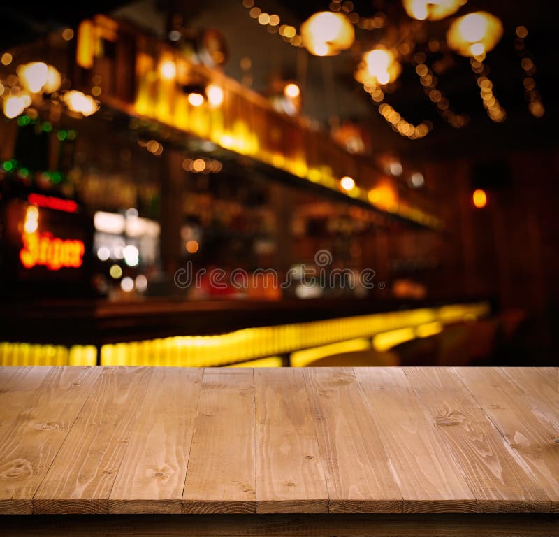 Empty Wooden Surface and Blurred View of Bar Interior. Space for Design ...