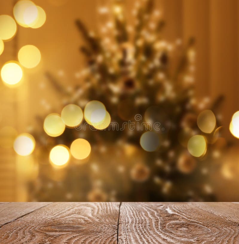 Empty Wooden Surface and Blurred View of Christmas Tree in Room, Space ...