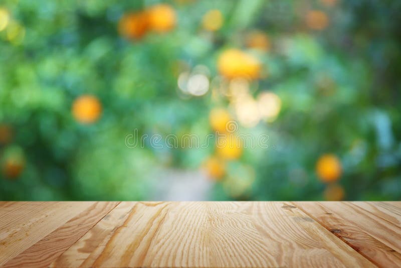 Empty Wooden Table in Front of Orange Field Stock Image - Image of ...