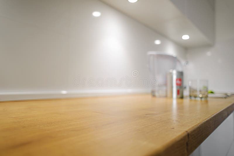 Empty Wooden Table Top on Blurred Kitchen Interior Stock Image - Image ...