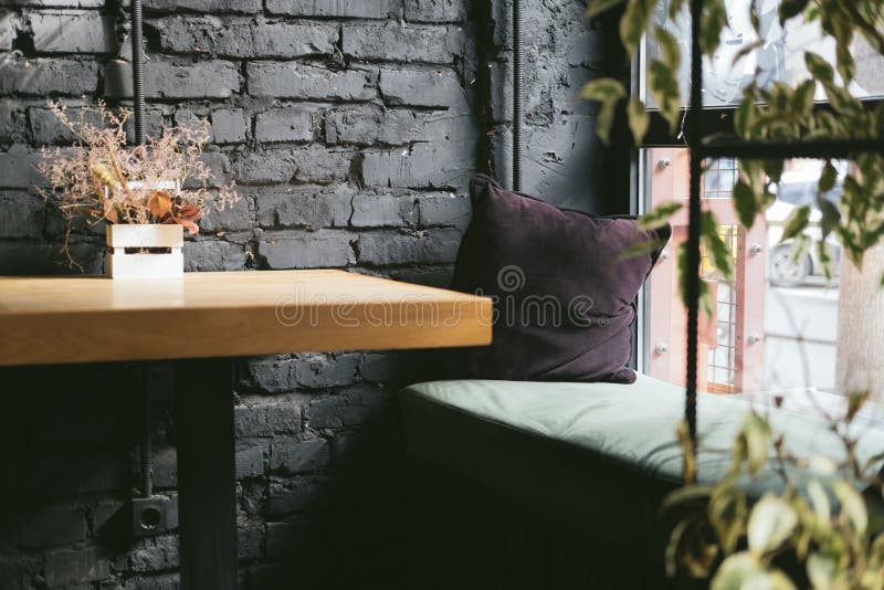 Empty Wooden Table and Window Sill with Pillow in Cafe by the Window ...