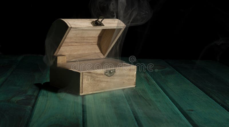 Empty Wooden Treasure Box on Green Table with Smoke All Around Stock ...