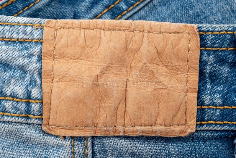 Empty Worn Leather Patch on Blue Jeans. Empty Space for Writing Stock ...