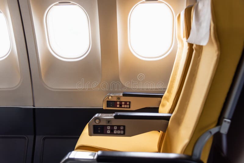 Empty Yellow Color Airplane Seat with Airplane Window Stock Photo ...