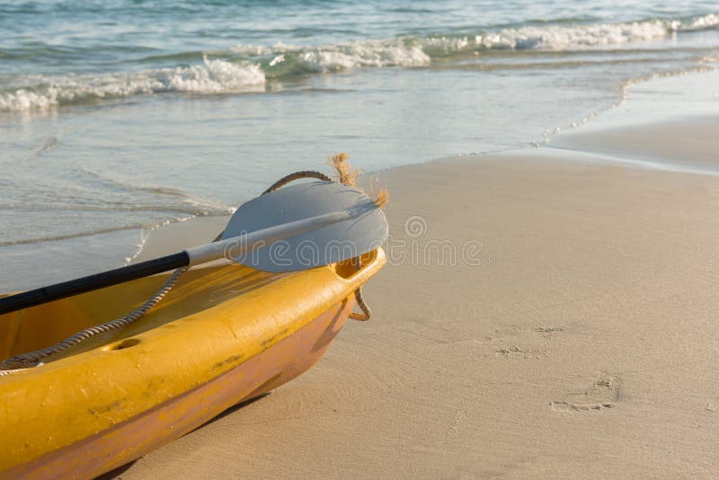 The Empty Yellow Kayak on the Beach. Stock Image - Image of destination ...