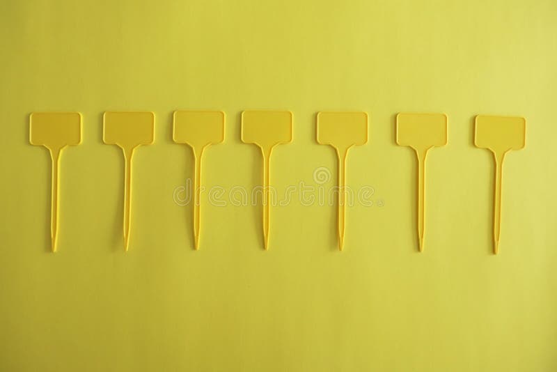 Empty Yellow Labels on Yellow Background Stock Photo - Image of sale ...