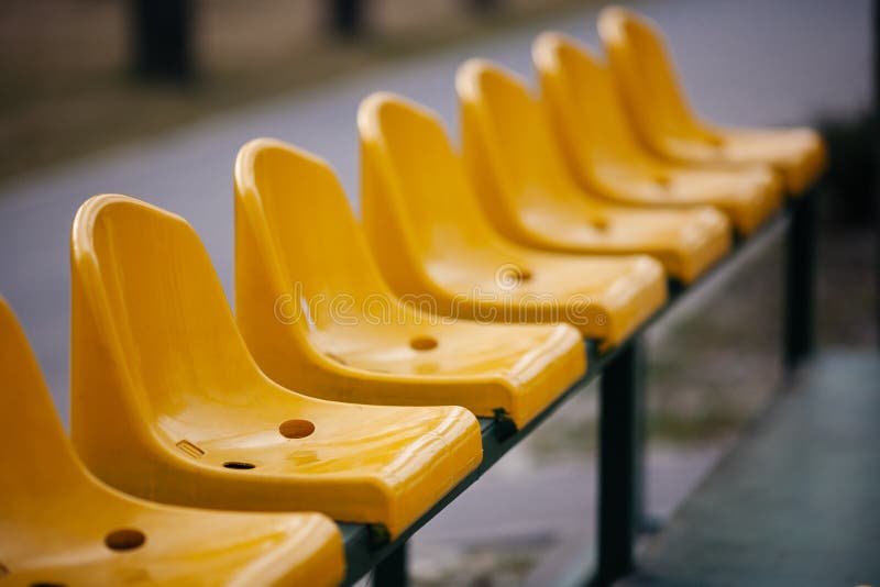 Empty Yellow Seats on the Sport Stadium Stock Photo - Image of chairs ...