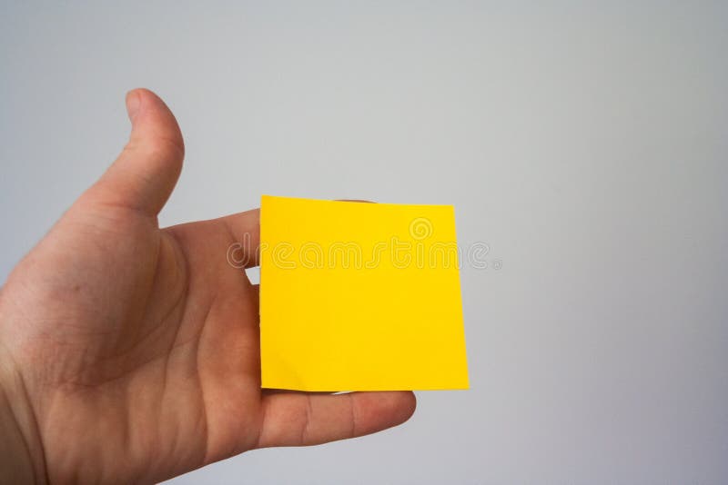 Empty Yellow Sticky Note in Human Fingers. Stock Image - Image of note ...
