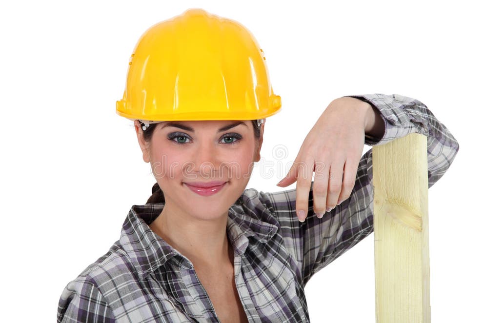 En kvinnlig snickare arkivfoto. Bild av konstruktion - 28194018