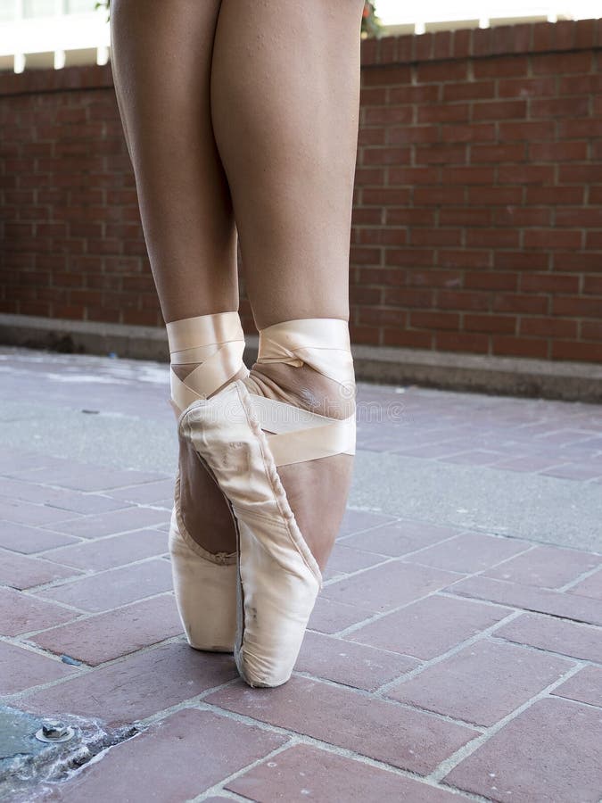 En Pointe- a Ballet Dancer in Her Ballet Pointe Shoes Stock Image ...