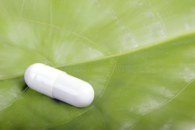 Encapsula una medicina imagen de archivo. Imagen de verde - 23061713