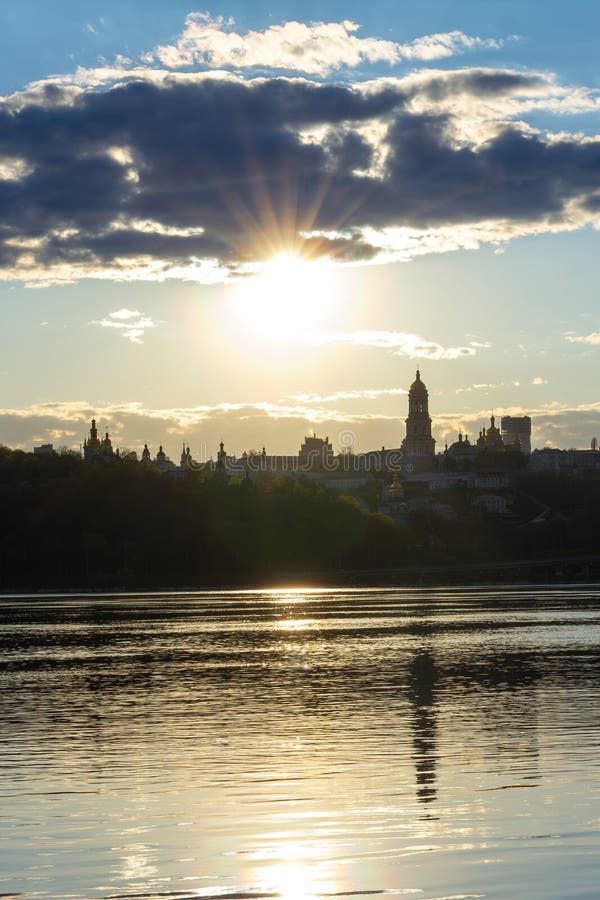 Dramatic Sunset with Kiev-Pechersk Lavra: Sun Breaking through Clouds ...