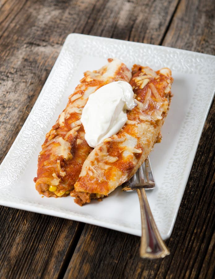Enchiladas on a Plate - Mexican Food Stock Image - Image of rustic ...