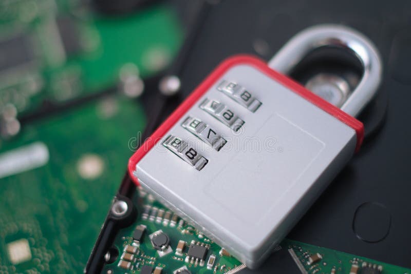 Encrypted Hard Disk. Padlock with Cipher on an Opened Hard Disk. Data ...