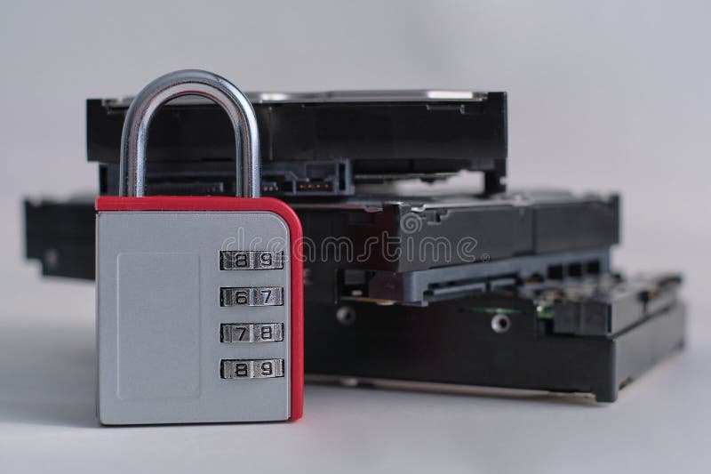 Encrypted Hard Disk. Padlock with Cipher on an Opened Hard Disk. Data ...