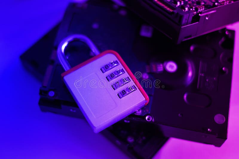 Encrypted Hard Disk. Padlock with Cipher on an Opened Hard Disk. Data ...