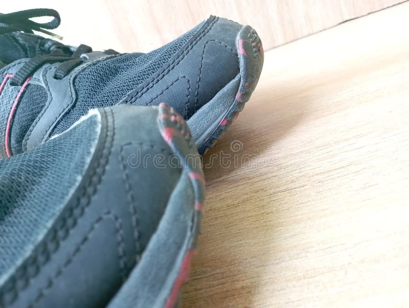 The End of Black Shoes on Wooden Pattern Ceramic Stock Image - Image of ...