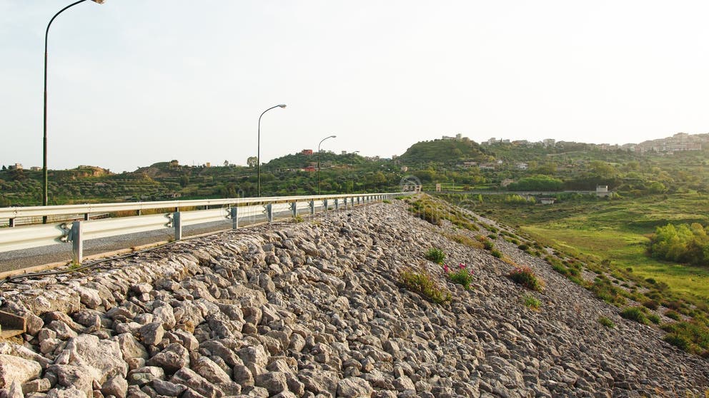 End of a Dam Next To a Highway Stock Image - Image of lake, pollution ...