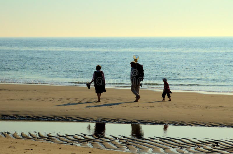 Winter Beach Walk stock image. Image of mother, walk, winter - 55153