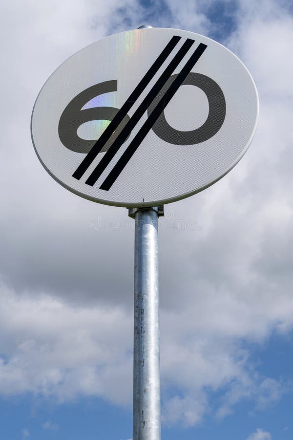 End of 60 km h speed limit stock image. Image of previous - 326814359