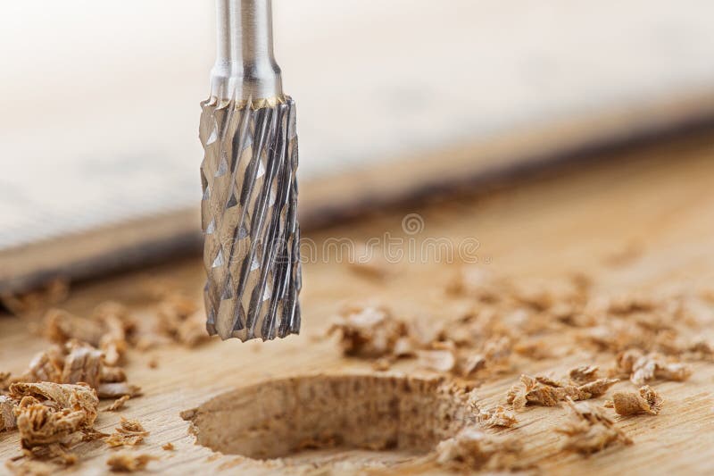 End Mill Makes a Hole in the Wooden Oak Table with Wood Stock Image ...