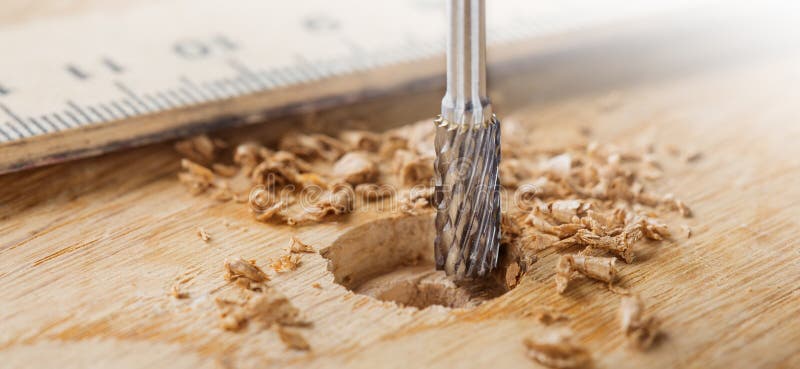 End Mill Makes a Hole in the Wooden Oak Table with Wood Stock Image ...