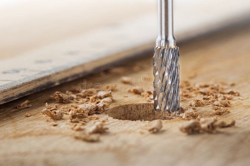 End Mill Makes a Hole in the Wooden Oak Table with Wood Stock Image ...