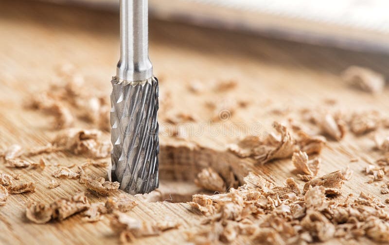 End Mill Makes a Hole in the Wooden Oak Table with Wood Stock Photo ...