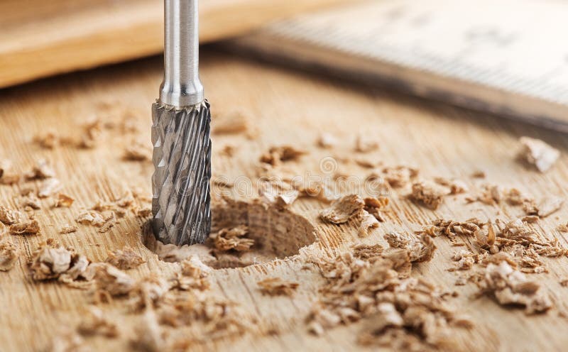 End Mill Makes a Hole in the Wooden Oak Table with Wood Stock Image ...