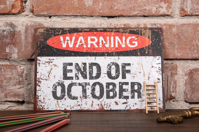 END of OCTOBER. Warning Sign on Wooden Office Desk Stock Photo - Image ...