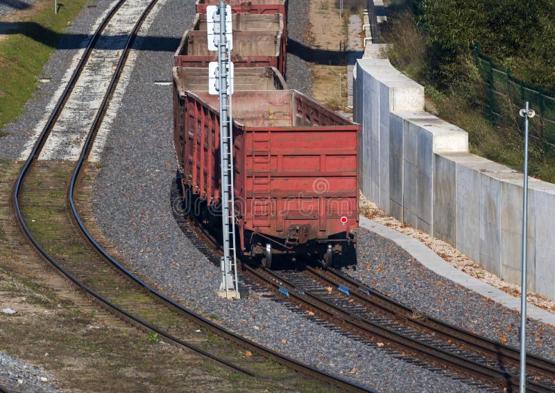 End of the Train with Empty Iron Wagons at the Train Station Stock ...