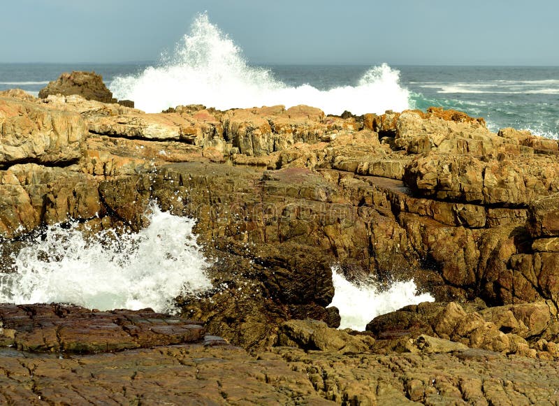 The Endless Incoming Tide Hitting the Rocks Stock Photo - Image of ...